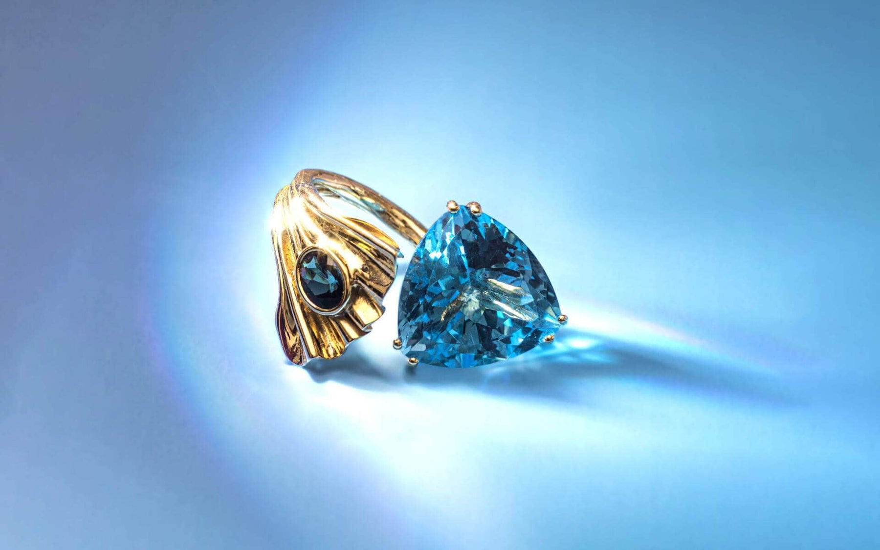 Eartha Iconic Design Blue Topaz Silver Ring | Designer Jewelry