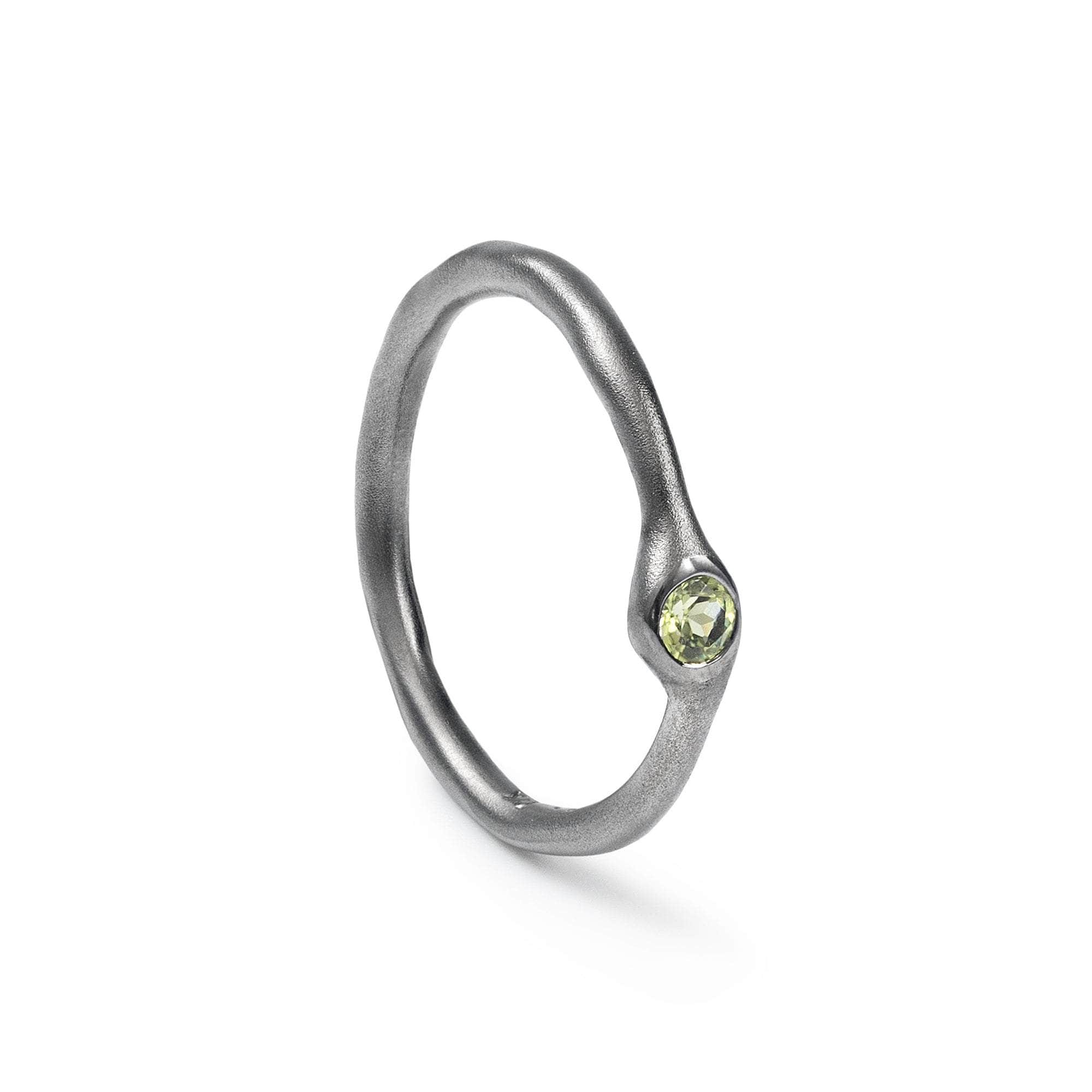 Vihrea Black Silver Ring with Natural Round-Cut Peridot | Shop Jewelry